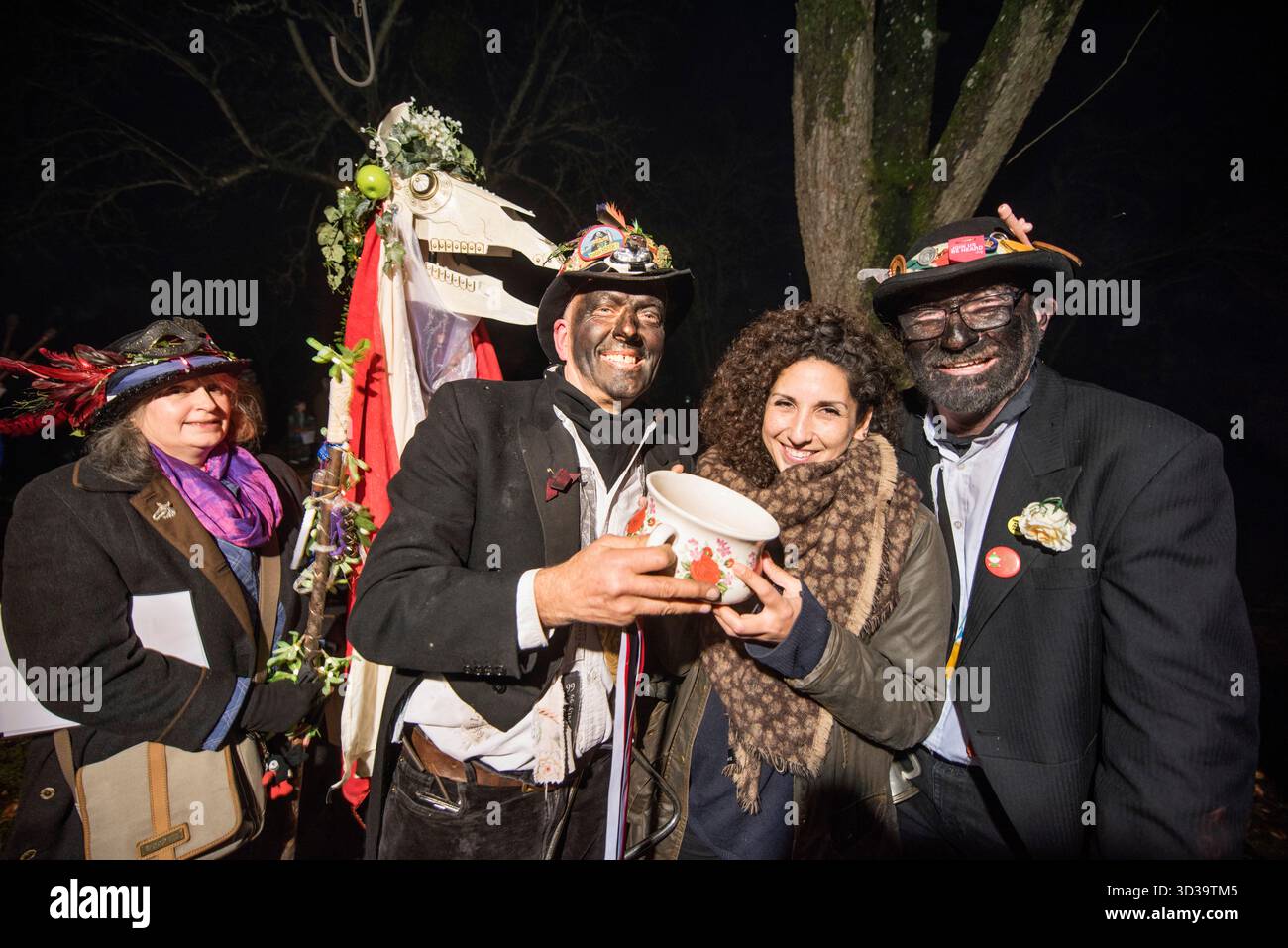 Roger Page of the Silurian Morris Men offers the ceremonial cider bowl ...