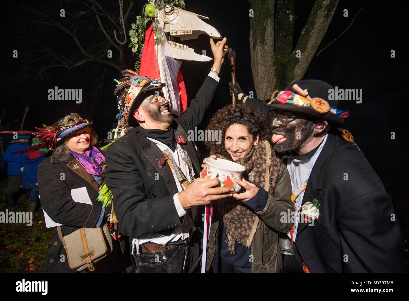 Roger Page of the Silurian Morris Men offers the ceremonial cider bowl ...