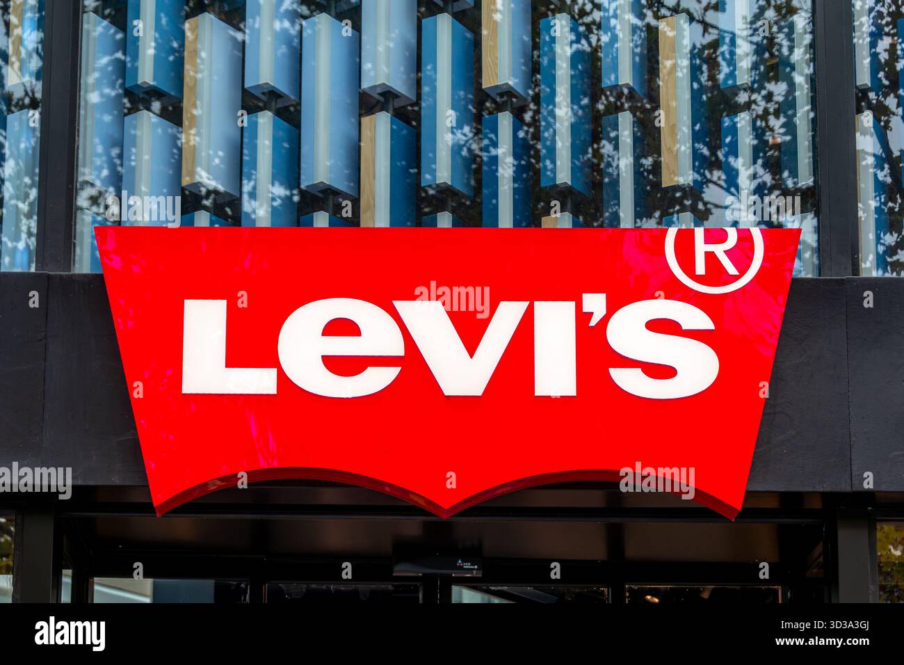 Sign and logo of a Levi's boutique. Levi Strauss and Co. is an American ...