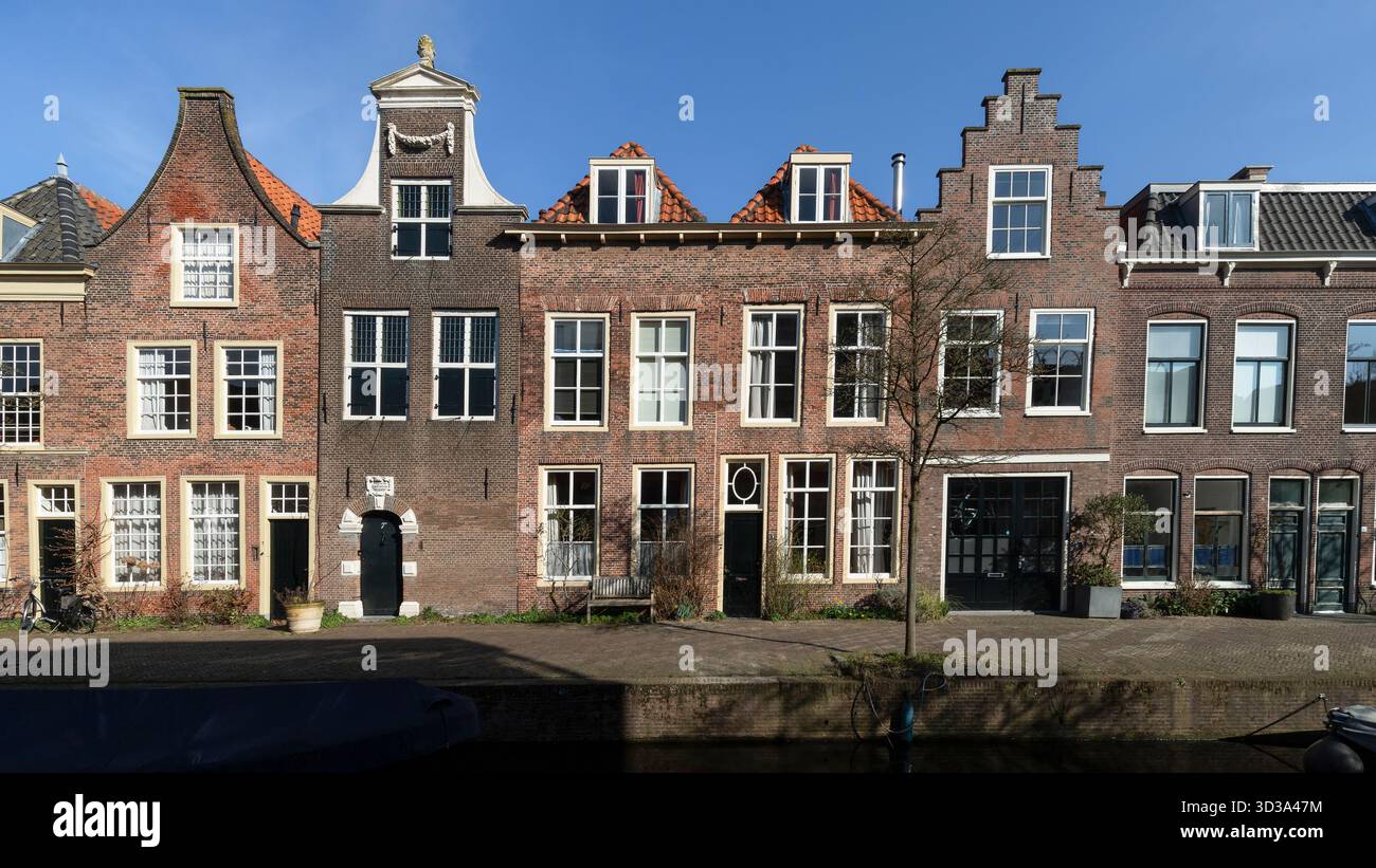 Historic canal houses in the old center of Leiden in the Netherlands ...