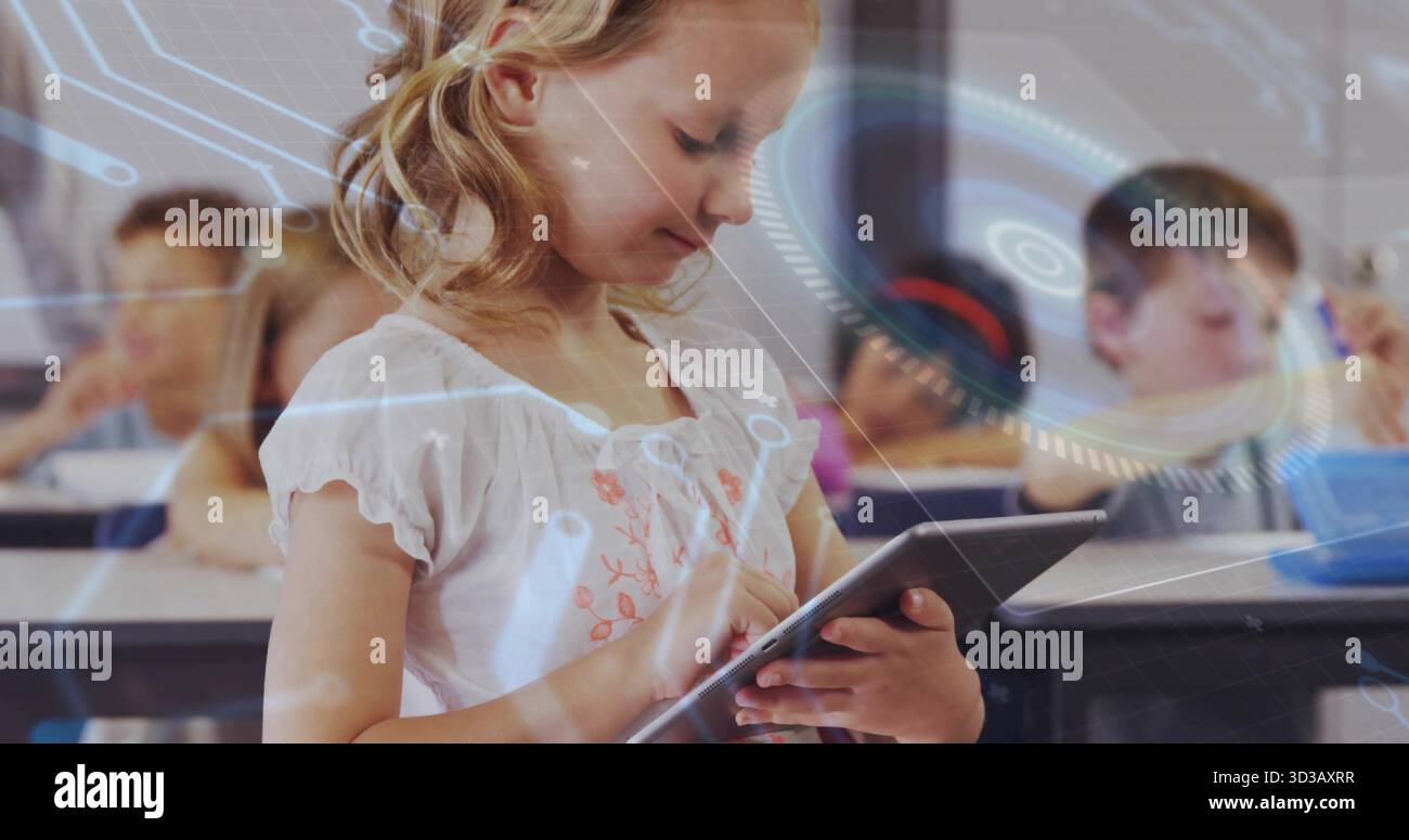 Tapping student girl interacting with tablet at classroom desk, with ...