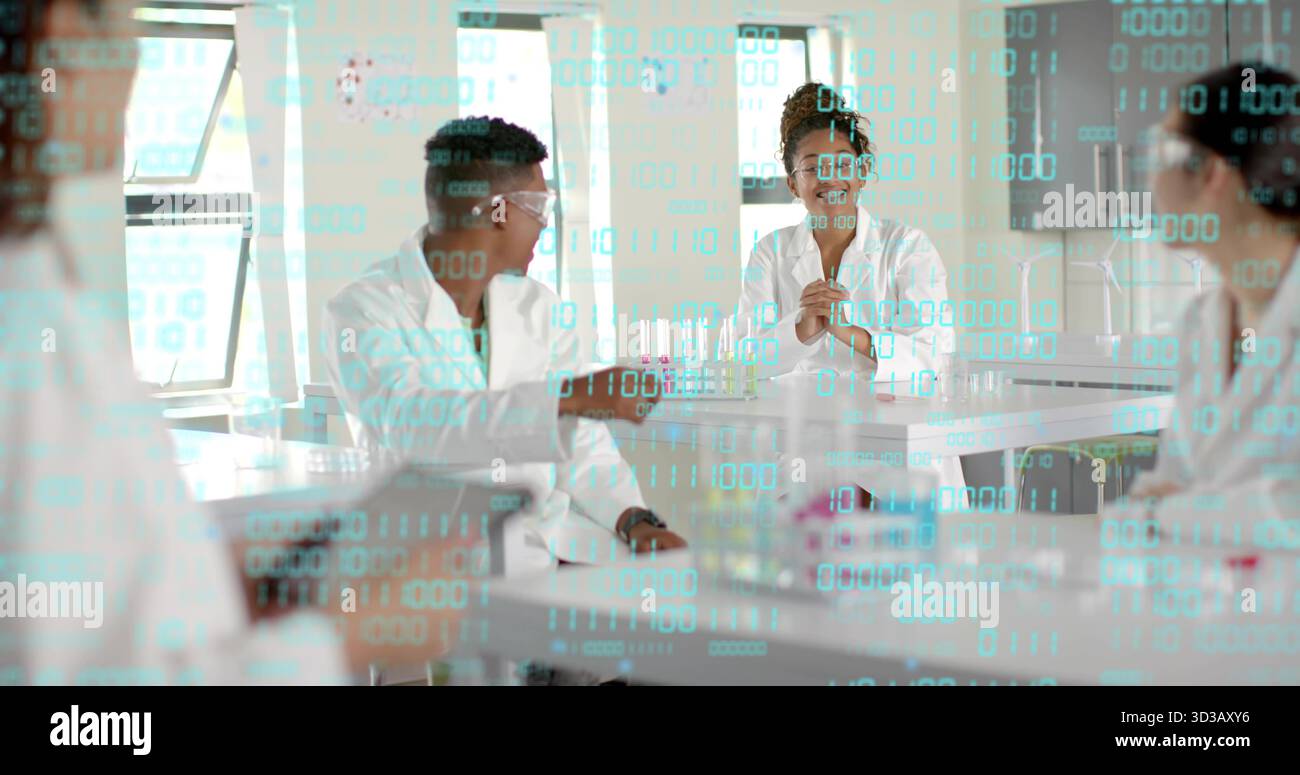 Lab scientists reviewing tablet data hi-res stock photography and ...