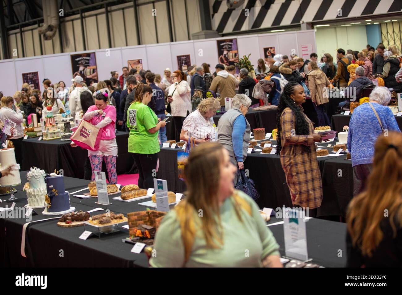 Visitors admire the creative cake displays at Cake International 2025 ...