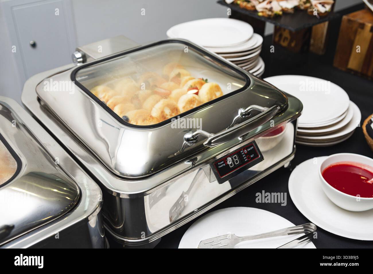 Stainless steel buffet soup hi-res stock photography and images - Alamy