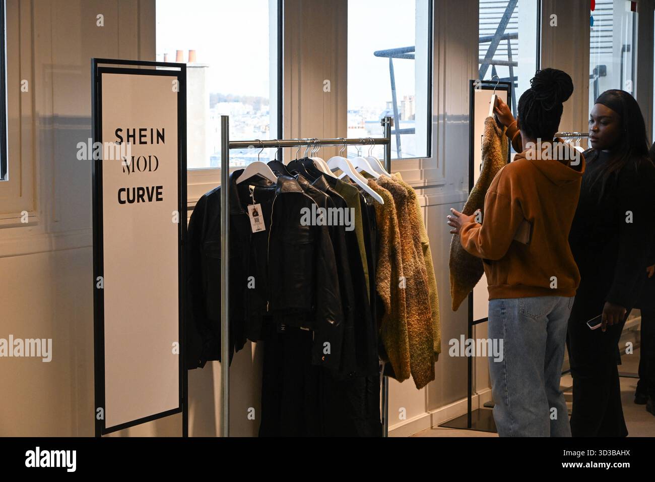 People visit the Shein's first permanent store during its opening day ...