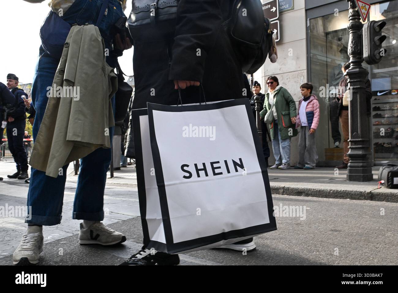 People visit the Shein's first permanent store during its opening day ...