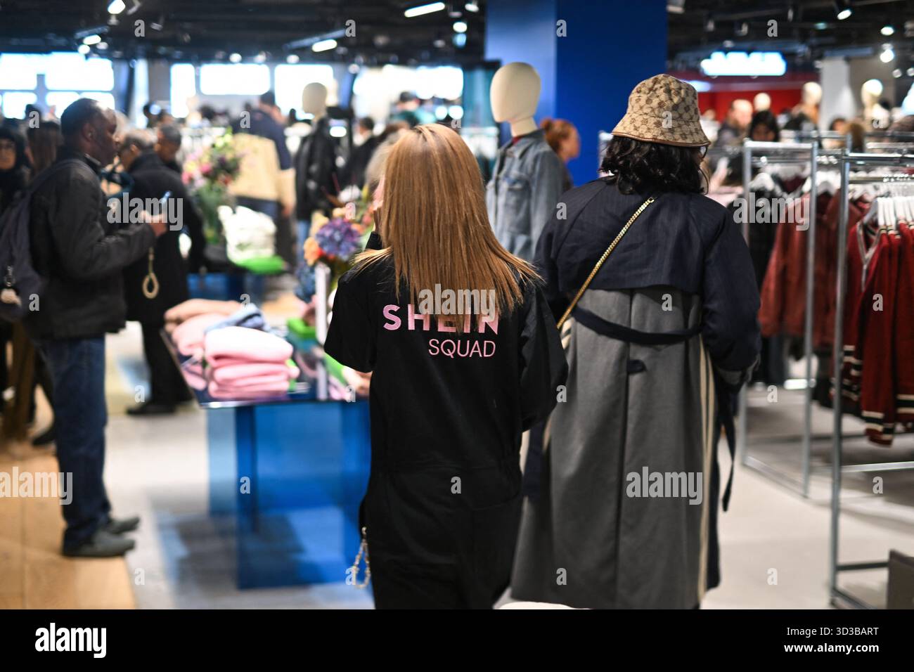 People visit the Shein's first permanent store during its opening day ...
