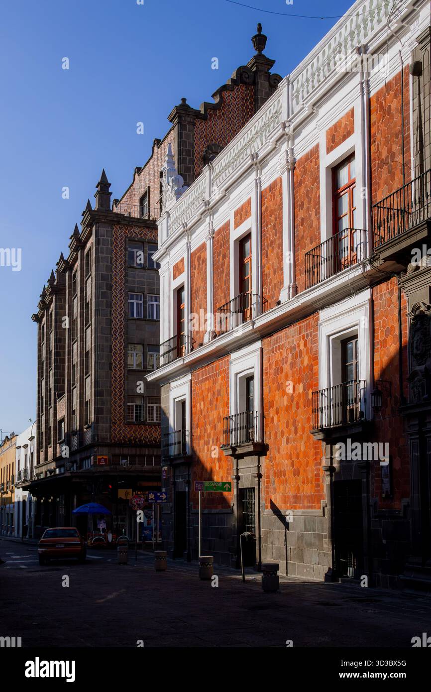 Colonial brick and tile facades contrast in Mexico City Stock Photo - Alamy