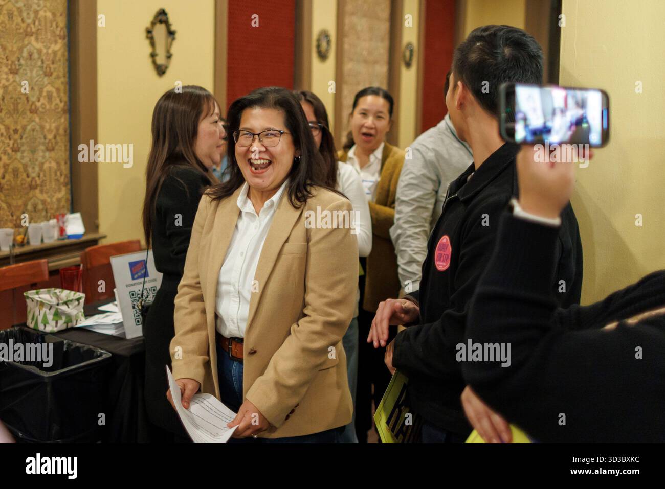 State Rep. Kaohly Her, a Democratic running for St. Paul mayor, smiles ...