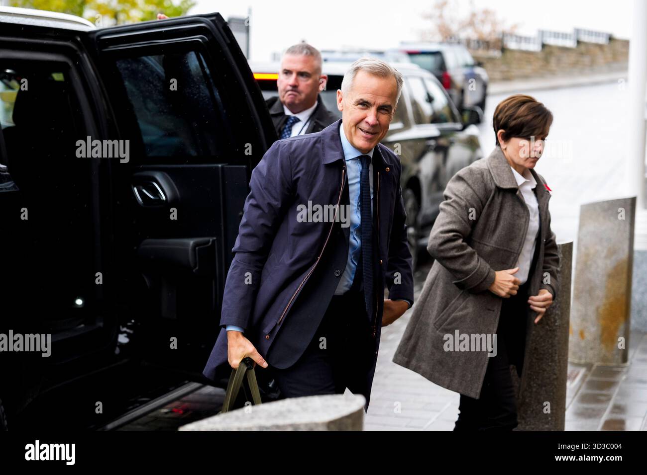 Prime Minister Mark Carney arrives for a meeting of the Liberal Caucus ...