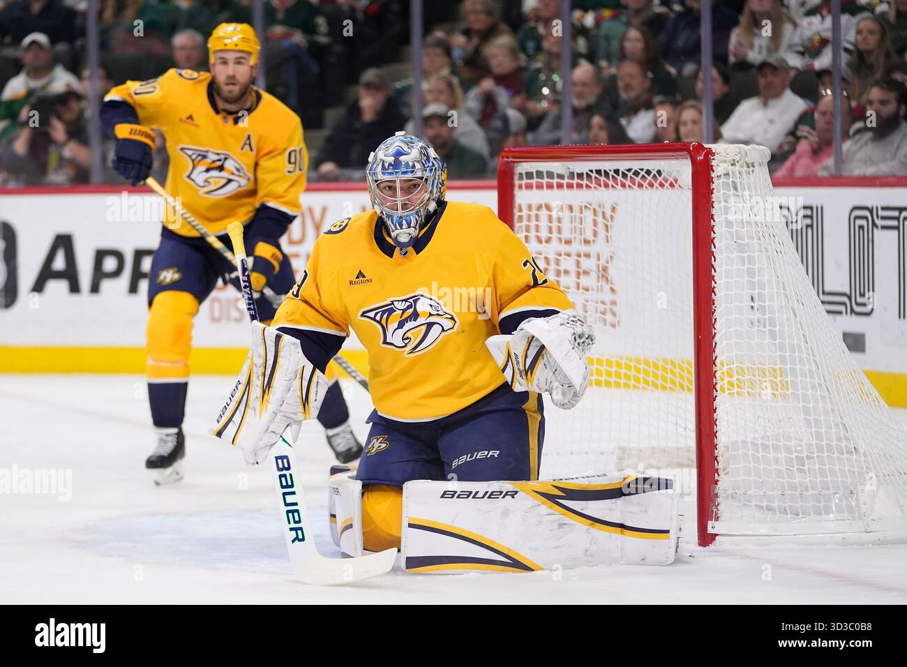 Nashville Predators goaltender Justus Annunen (29), front, and center ...