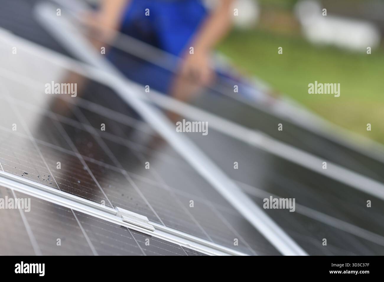 Rooftop solar power system. Process of installing solar panels on the ...