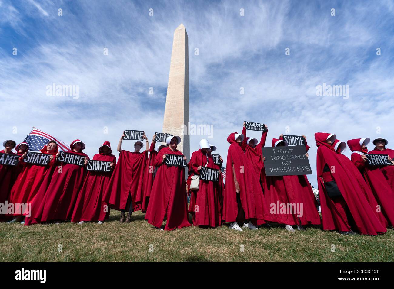 Demonstrators dressed as the tv series The Handmaid's Tale protest at ...