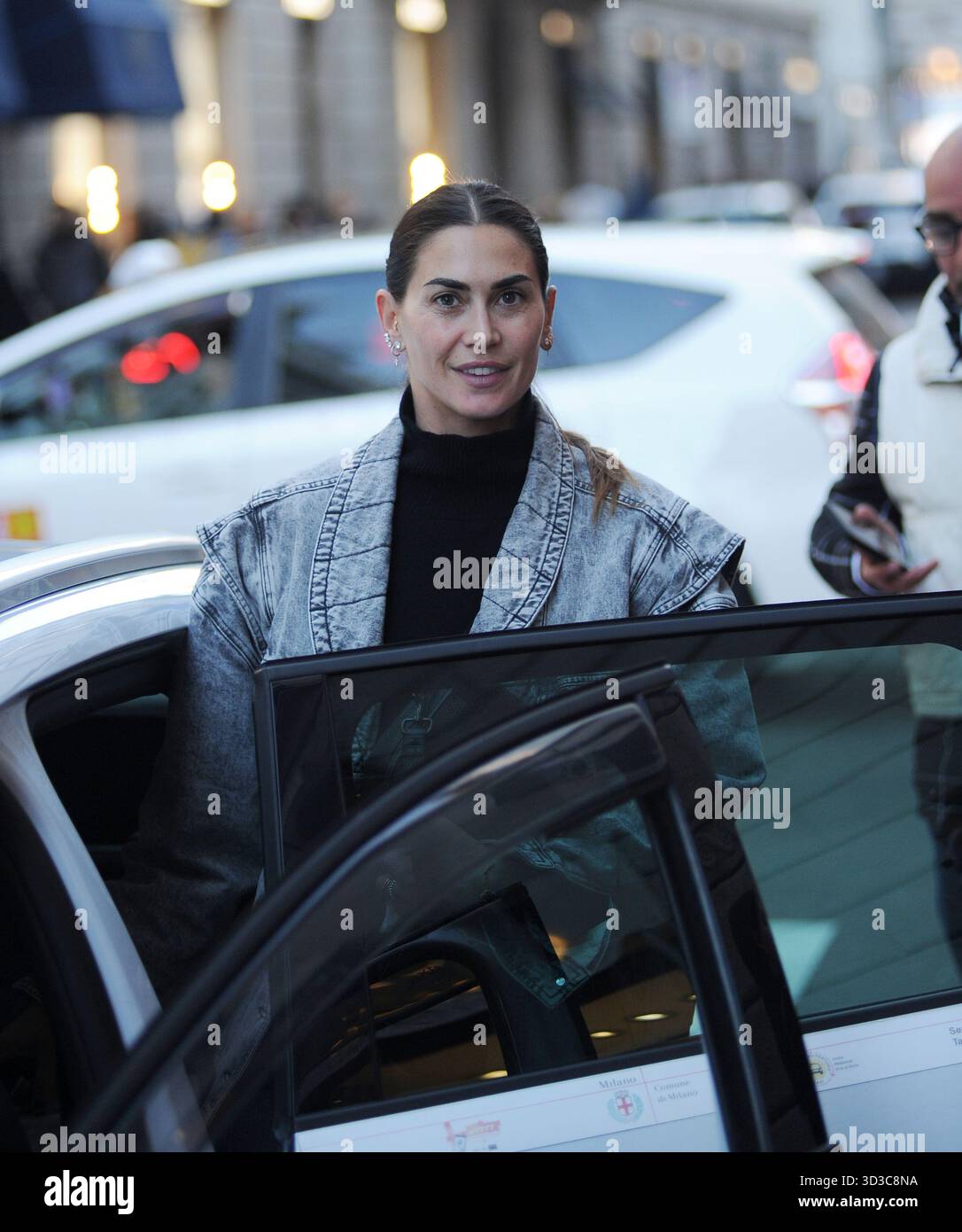 Milan, Melissa Satta arrives downtown and enters the Omega boutique to ...
