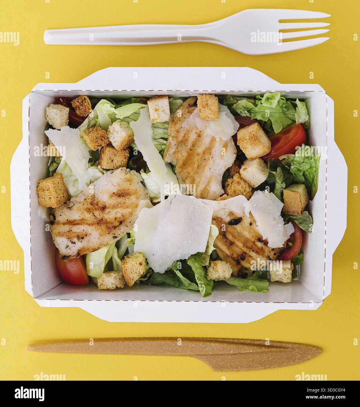 Food, Caesar salad packed on craft box for take away Stock Photo - Alamy