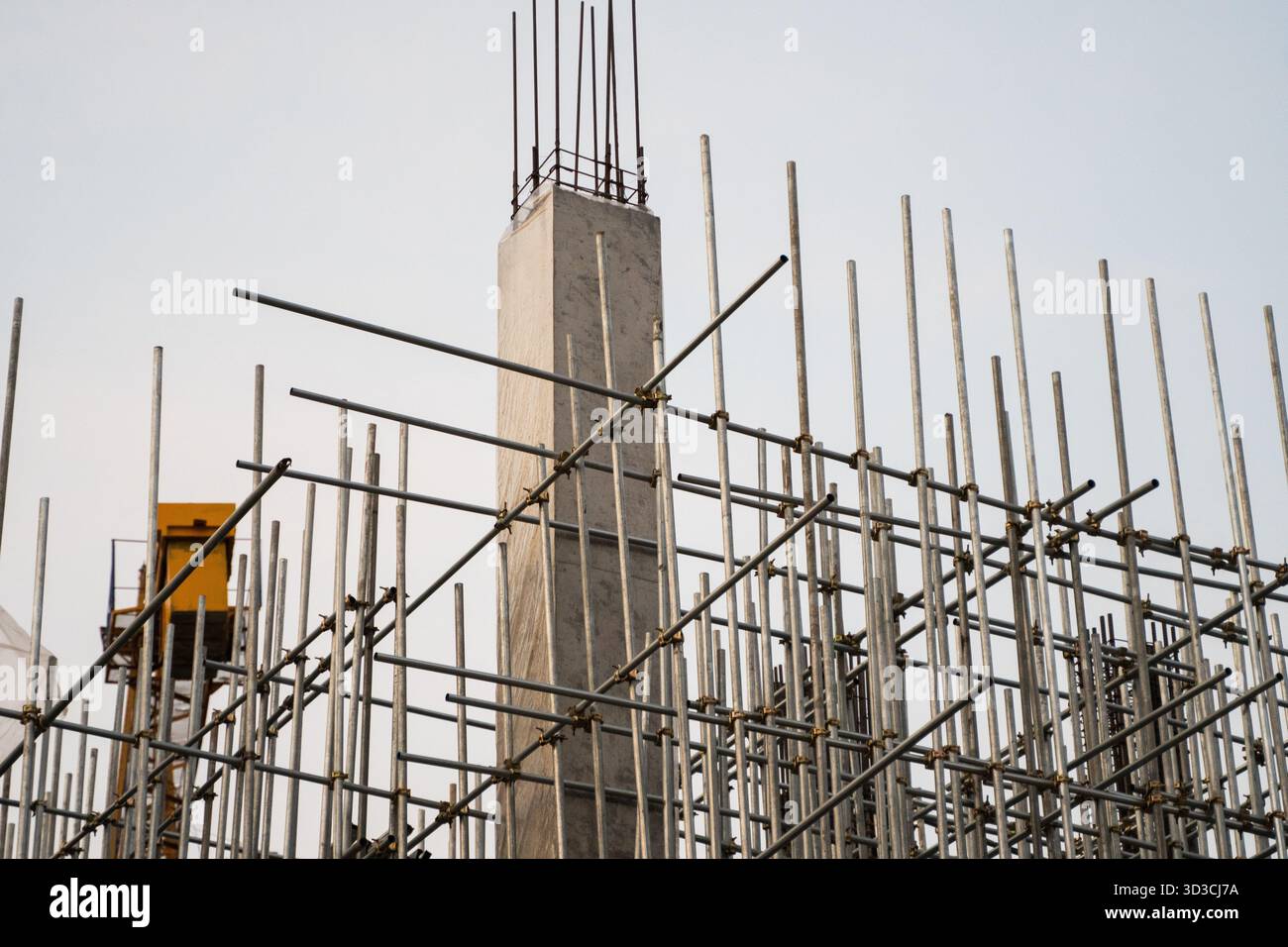 Vertical concrete column and scaffolding structure on industrial ...