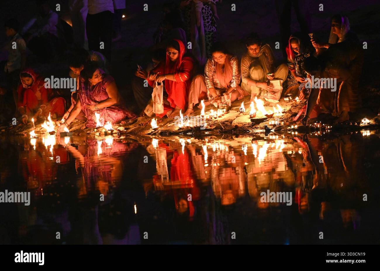 NEW DELHI, INDIA - NOVEMBER 5: Devotees celebrating Dev Deepawali ...