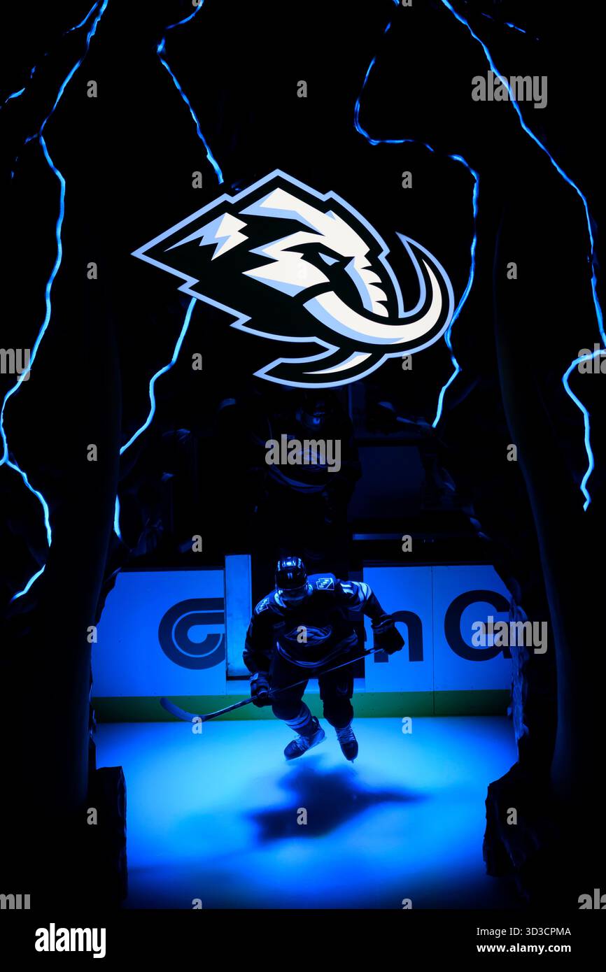 Utah Mammoth right wing Dylan Guenther (11) skates onto the ice before ...