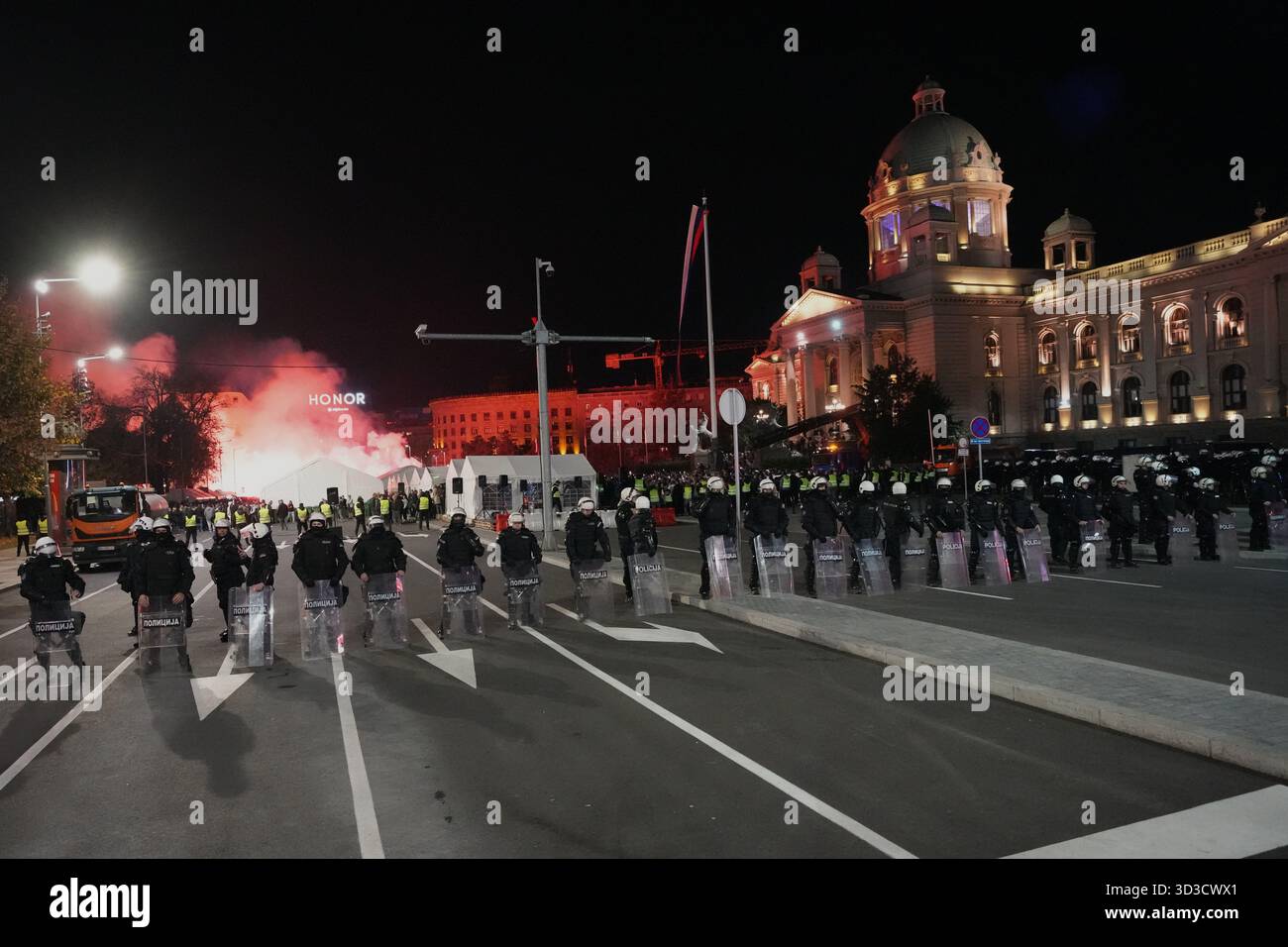 Serbian riot police separate rival crowds of opponents and loyalists of ...