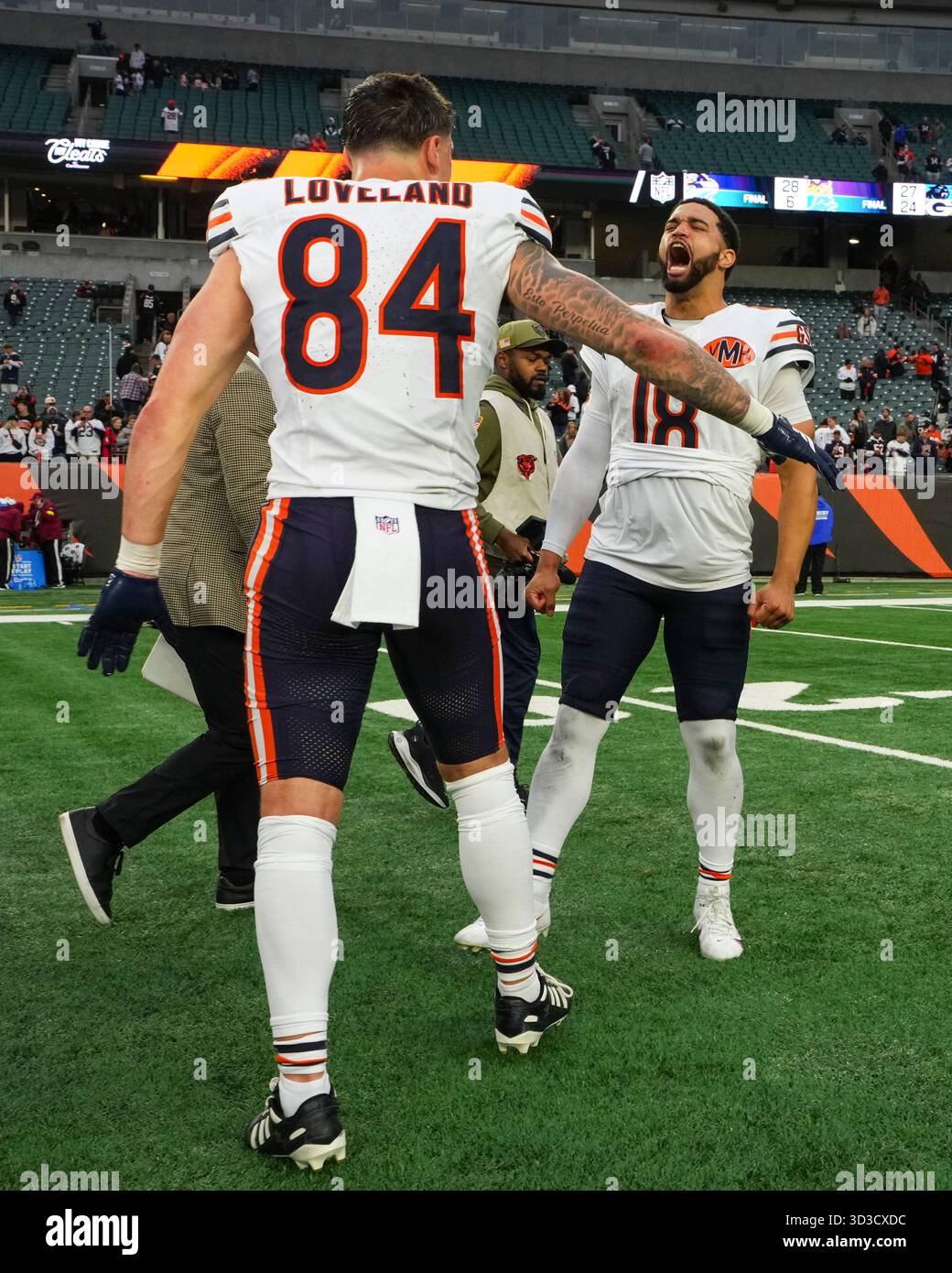 Chicago Bears quarterback Caleb Williams (18) celebrates with teammate ...