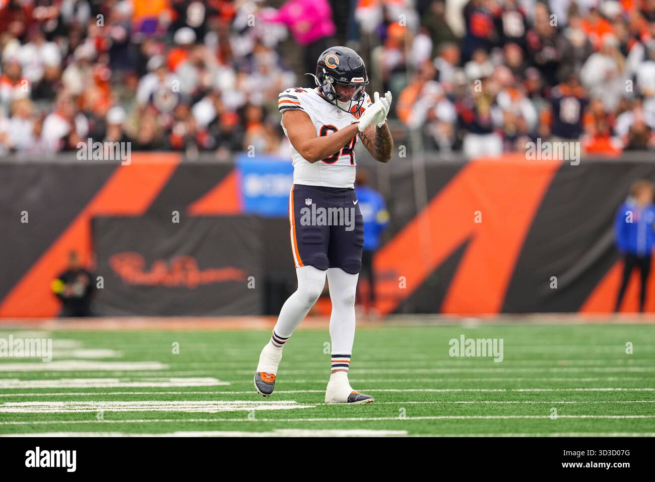 Chicago Bears defensive end Austin Booker (94) reacts during an NFL football game against the ...