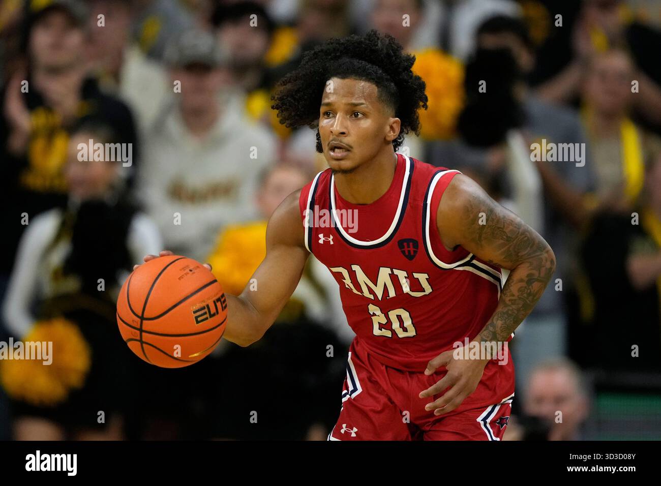 Robert Morris guard Albert Vargas drives up court during the first half ...