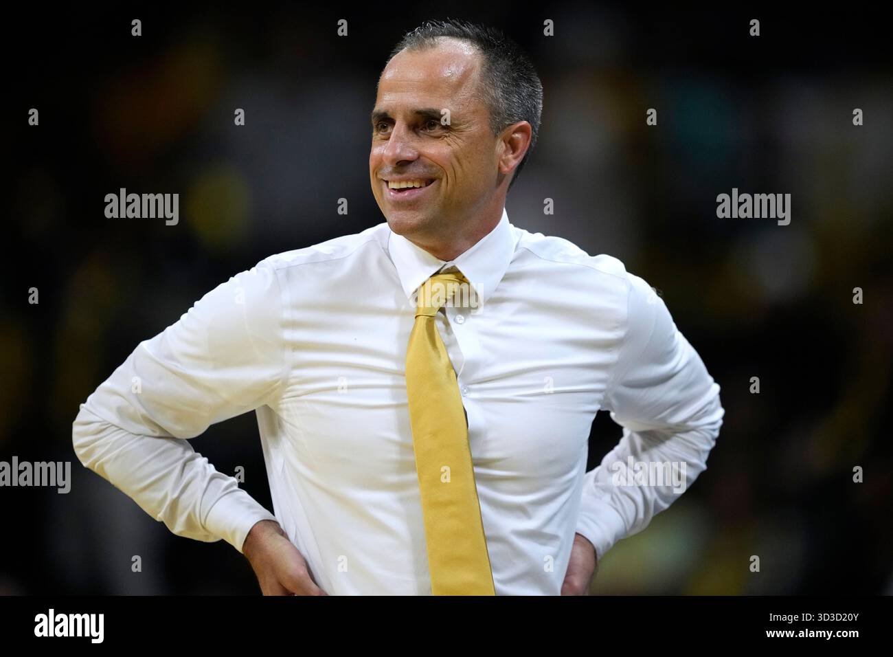 Iowa head coach Ben McCollum watches from the bench during the first ...