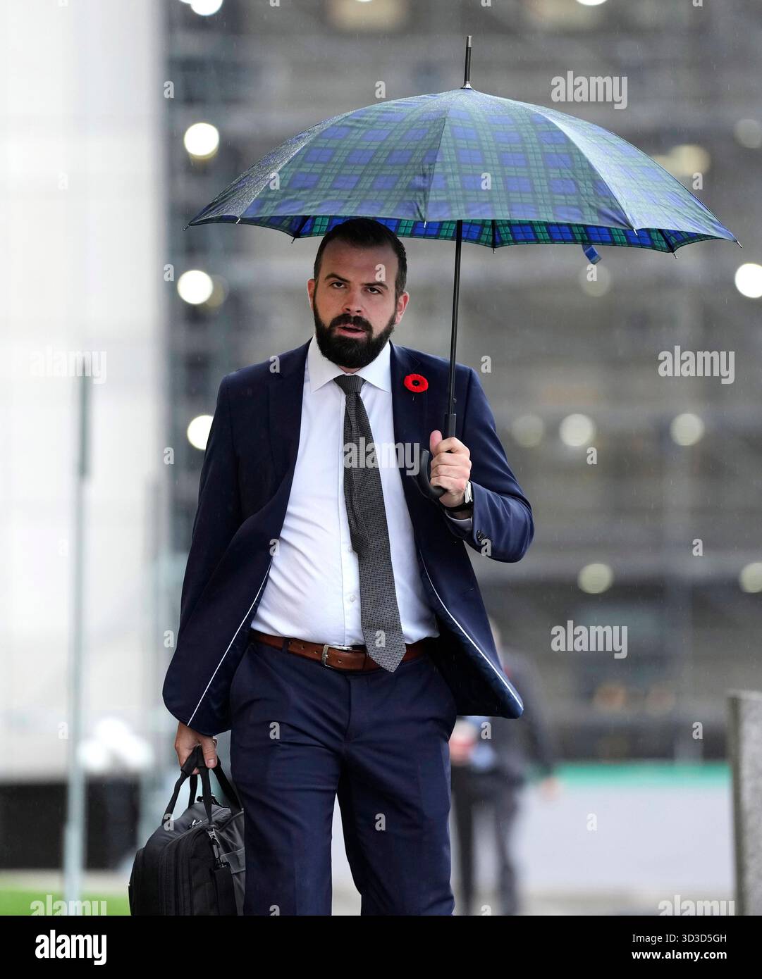 Conservative MP Aaron Gunn makes his way to a meeting of the ...
