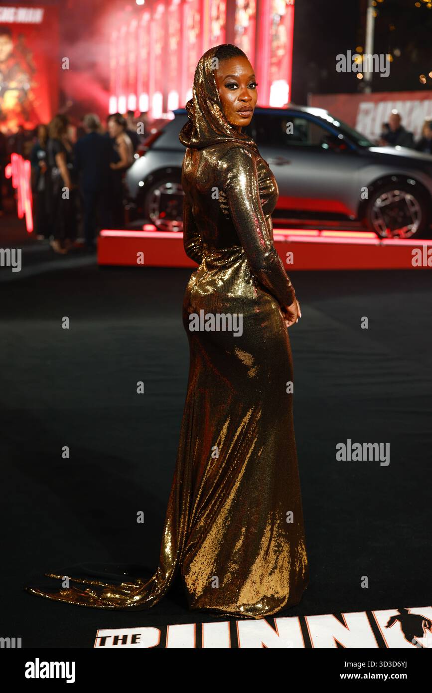 Olunike Adeliyi poses for photographers upon arrival at the premiere of ...