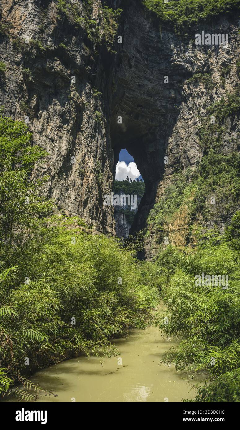 Muddy water stream flowing through the landscape of the massive ...