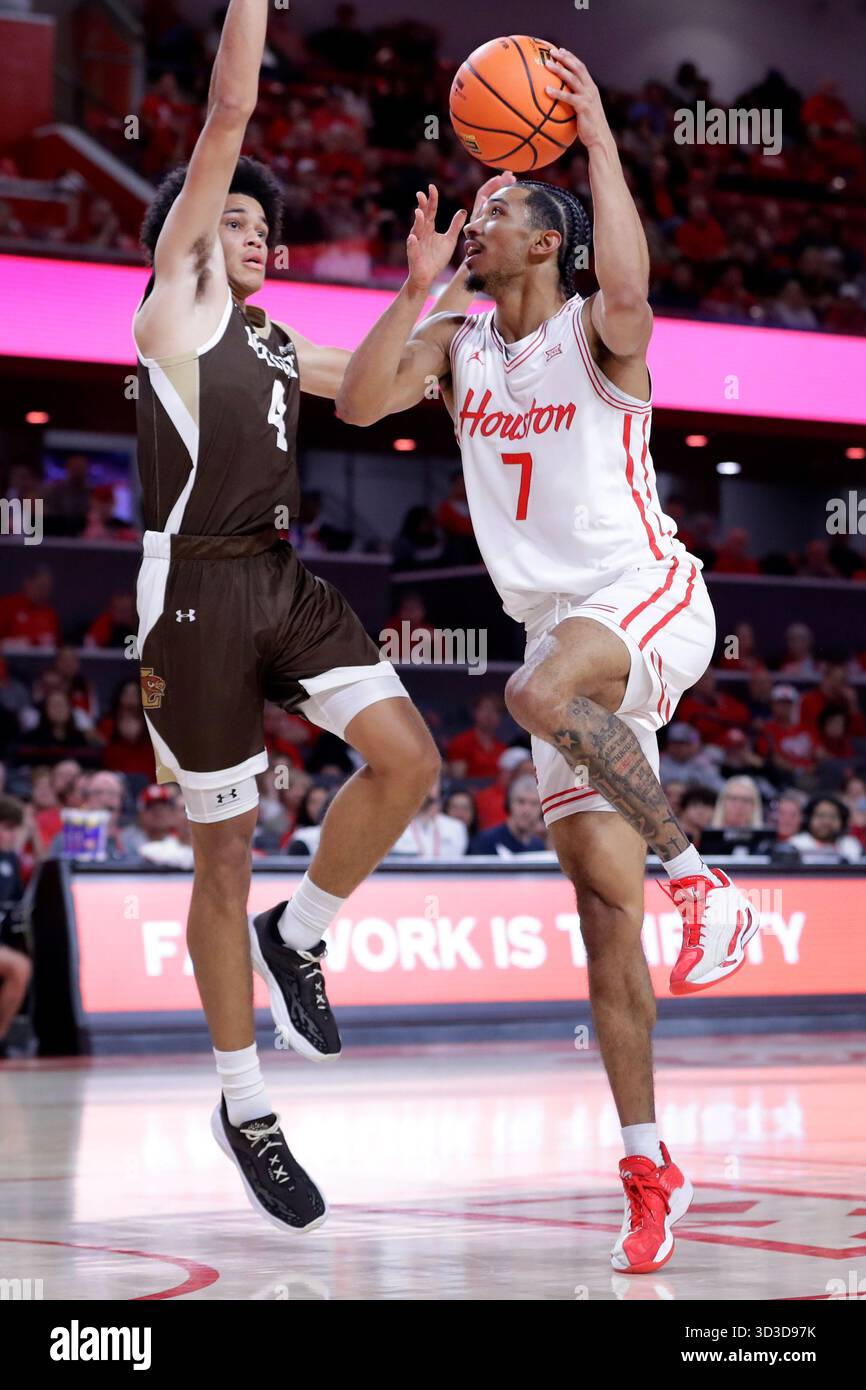 Houston guard Milos Uzan (7) puts up a shot against Lehigh guard Joshua Ingram (4) during the ...