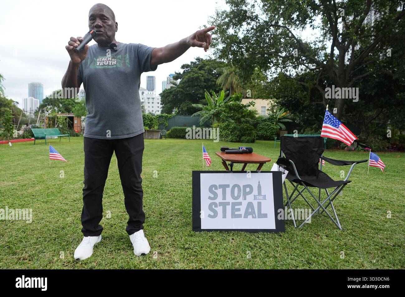 Dr. Marvin Dunn speaks during a protest in the Overtown neighborhood in ...