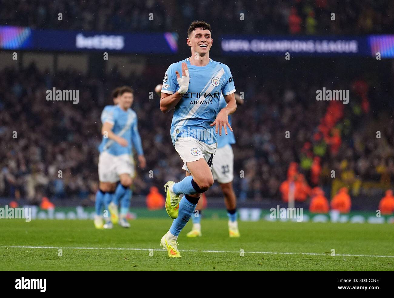 Manchester City's Phil Foden celebrates scoring his sides third goal ...