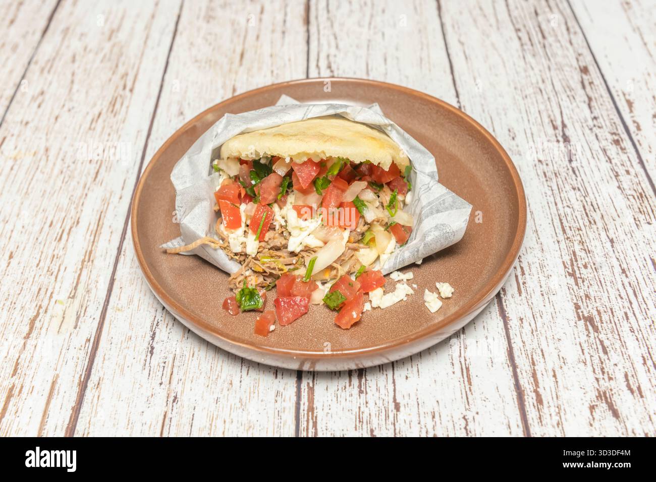 Venezuelan corn arepa with shredded beef and lots of cheese Stock Photo ...