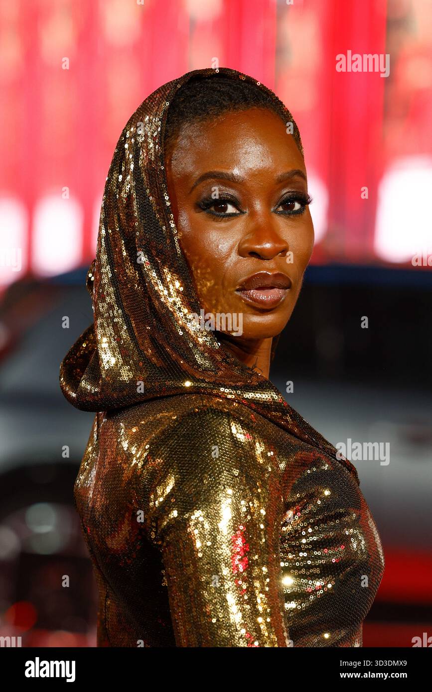 Olunike Adeliyi poses for photographers upon arrival at the premiere of ...