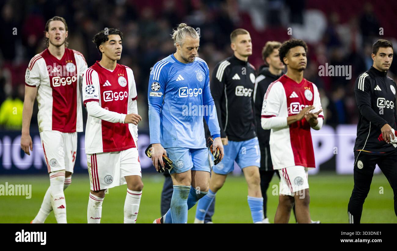 AMSTERDAM – (l-r) Gerald Alders of Ajax, Ajax goalkeeper Remko Pasveer ...
