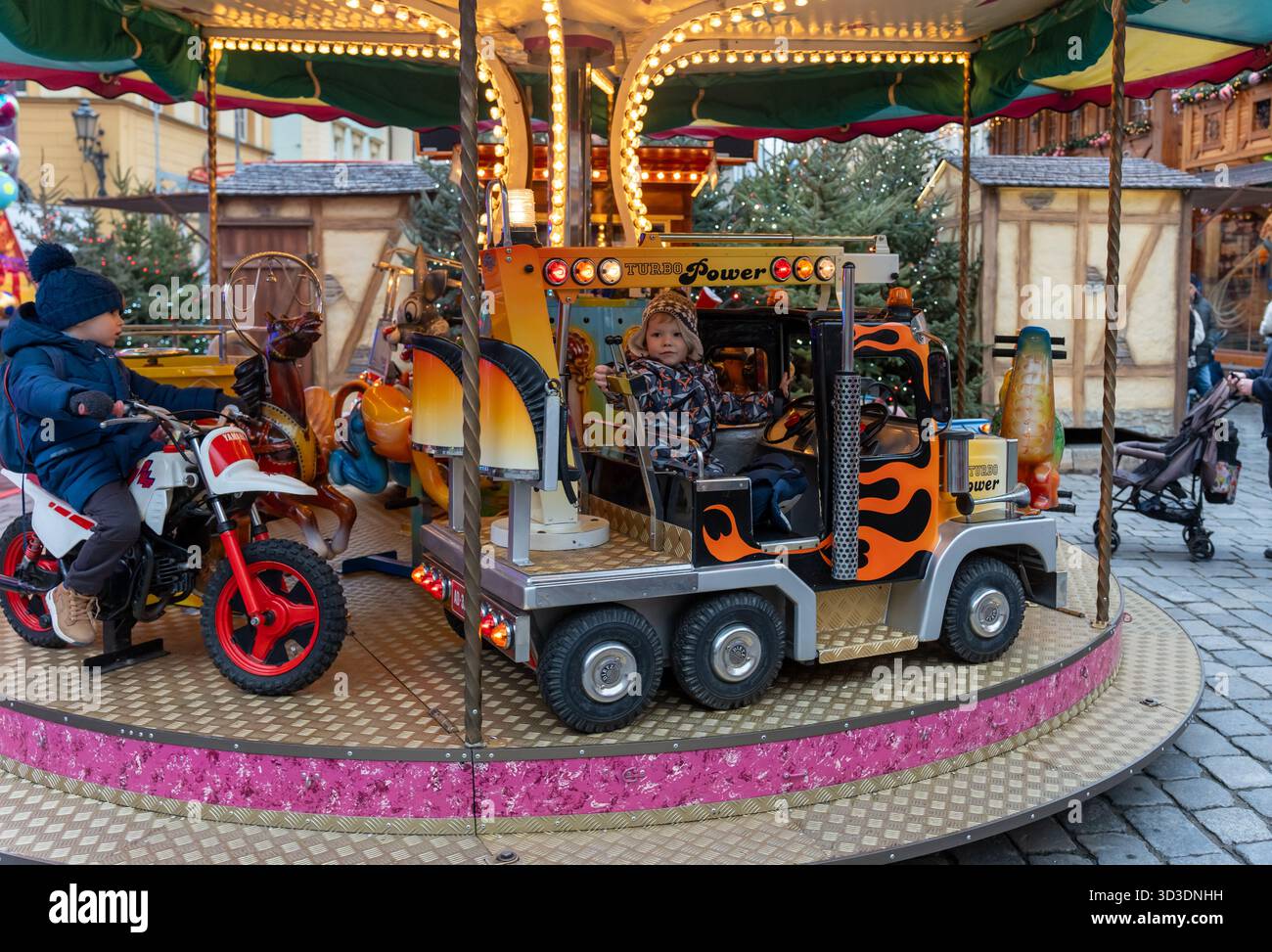 04.12.2024 Wroclaw, Poland. Children enjoying colorful truck-themed ...