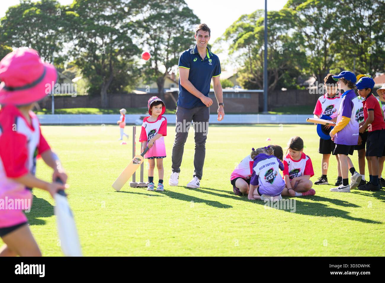 Australian cricketer Pat Cummins takes part in a training drill with ...