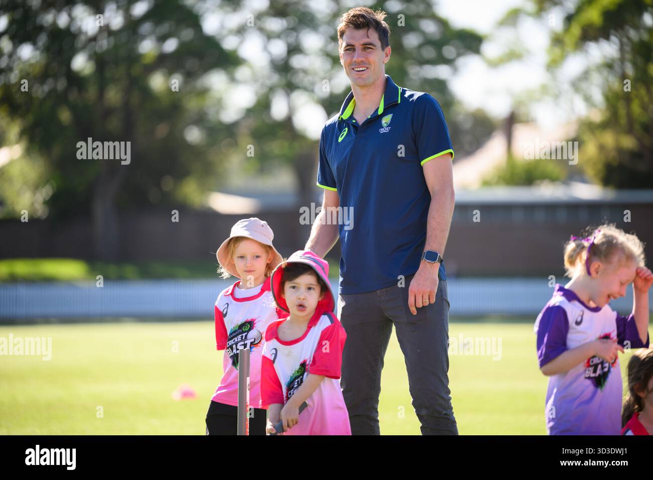 Australian cricketer Pat Cummins takes part in a training drill with ...