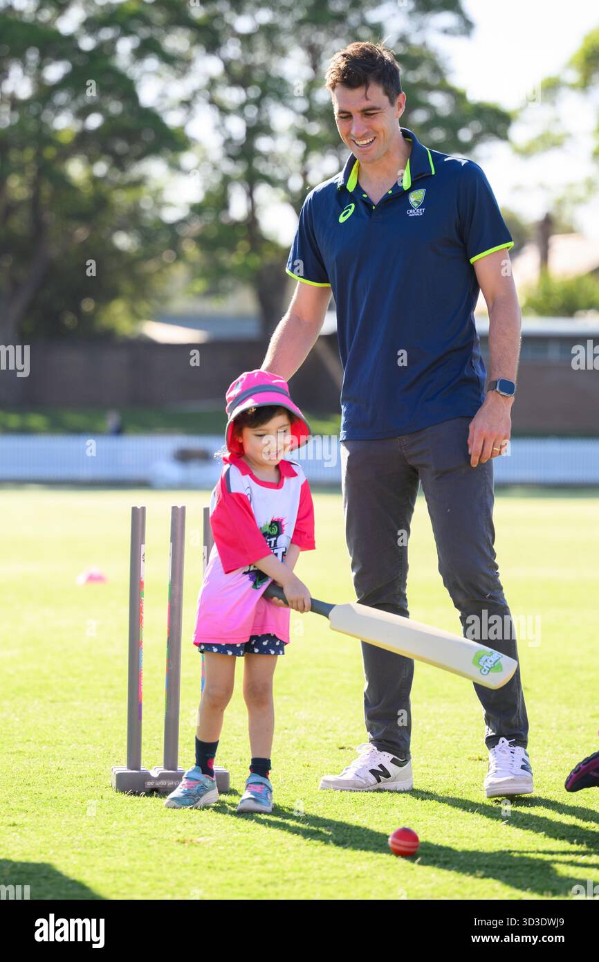 Australian cricketer Pat Cummins takes part in a training drill with ...
