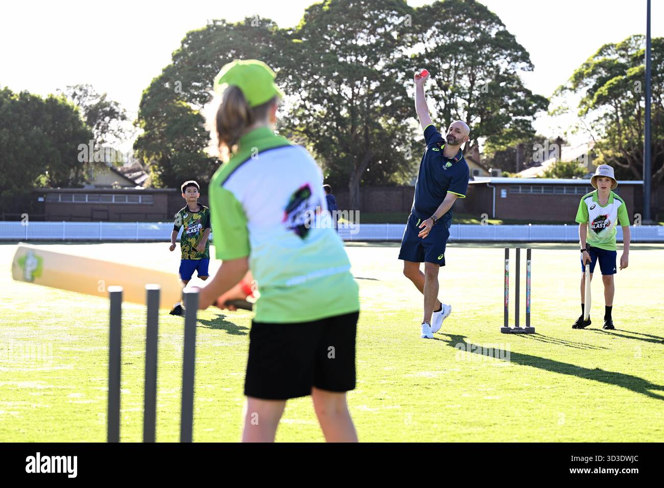Australian cricketer Nathan Lyon takes part in a training drill with ...