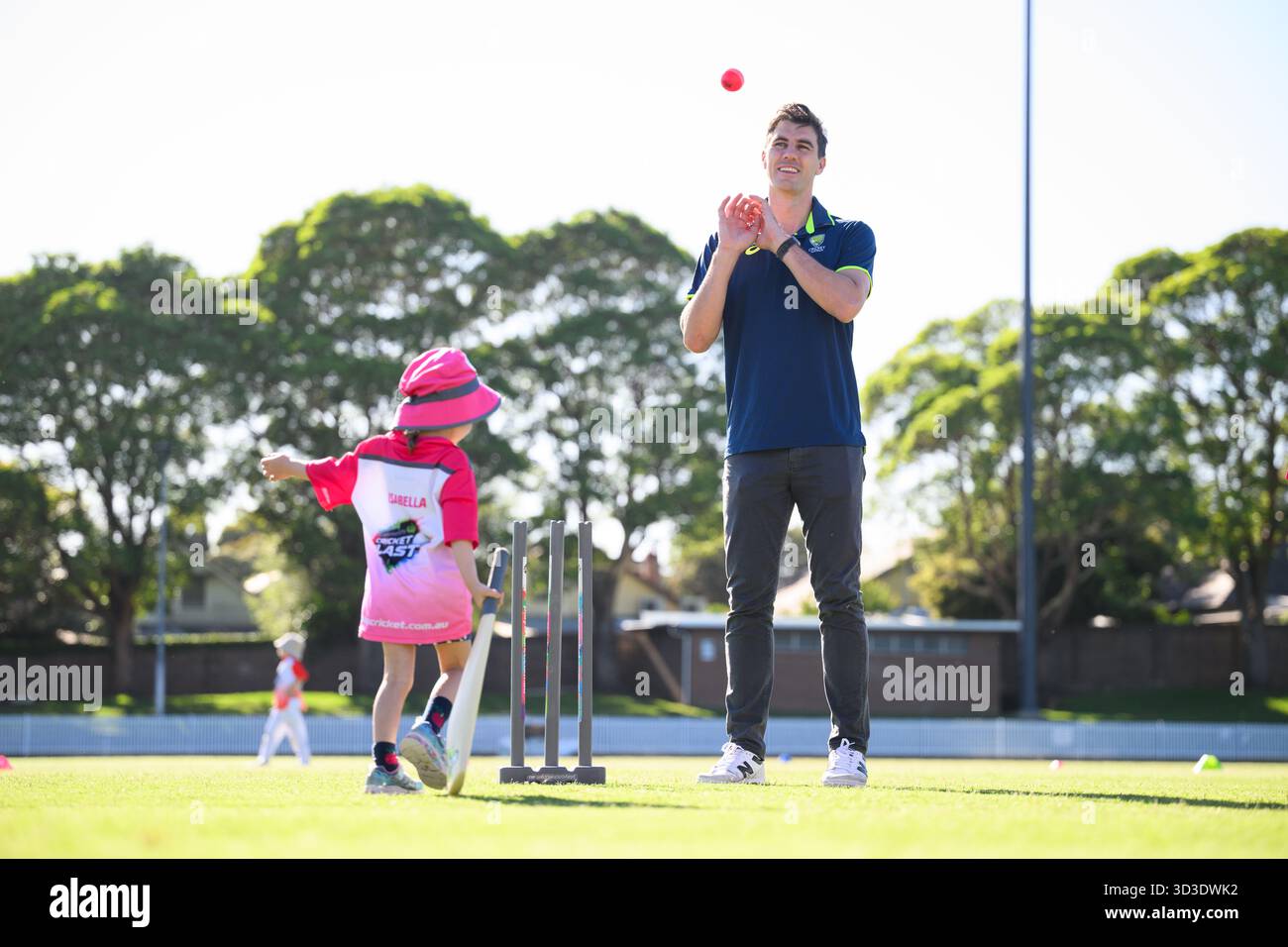 Australian cricketer Pat Cummins takes part in a training drill with ...