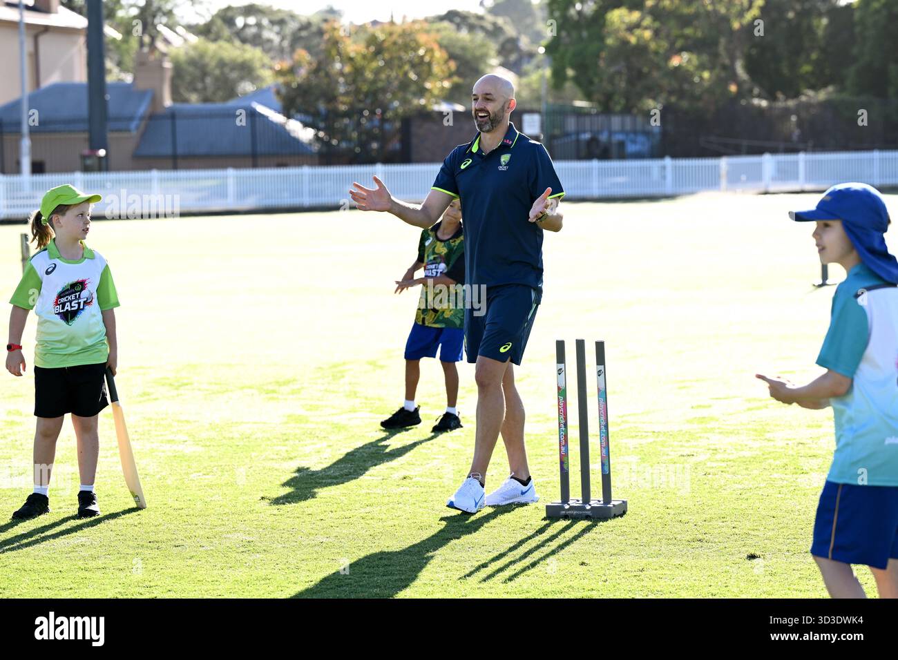Australian cricketer Nathan Lyon takes part in a training drill with ...