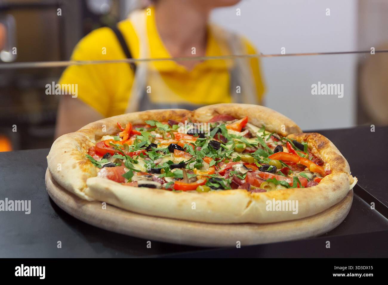Pizza cooking in tradition hi-res stock photography and images - Alamy