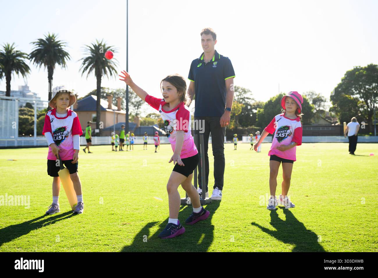 Australian cricketer Pat Cummins takes part in a training drill with ...