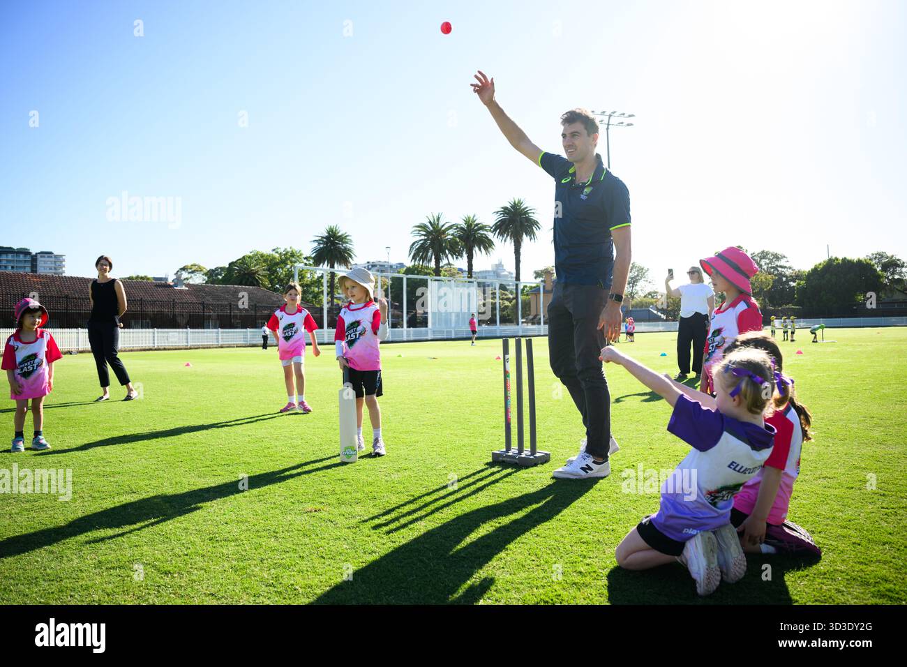 Australian cricketer Pat Cummins takes part in a training drill with ...