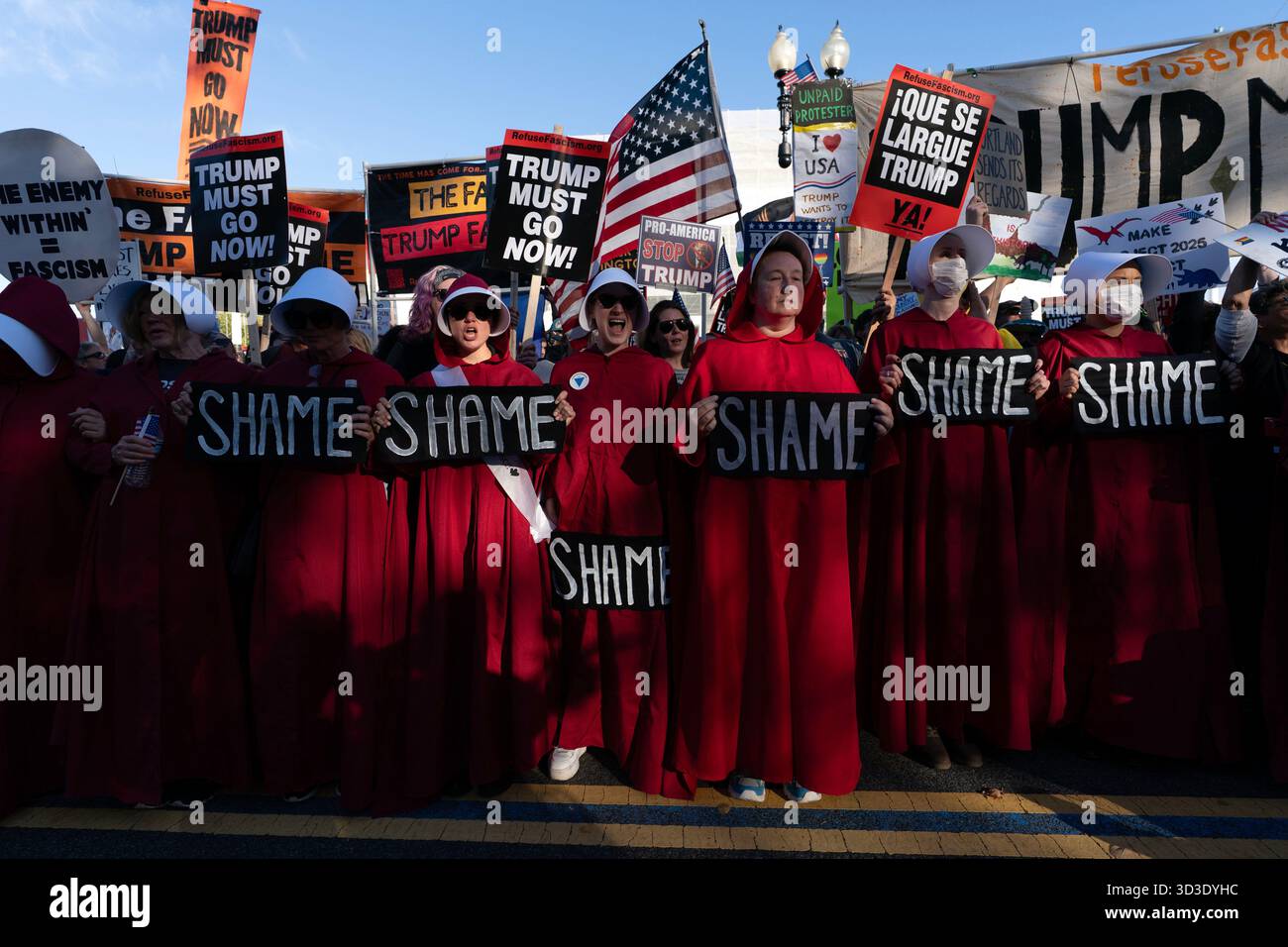 Demonstrators dressed as the tv series The Handmaid's Tale rally ...