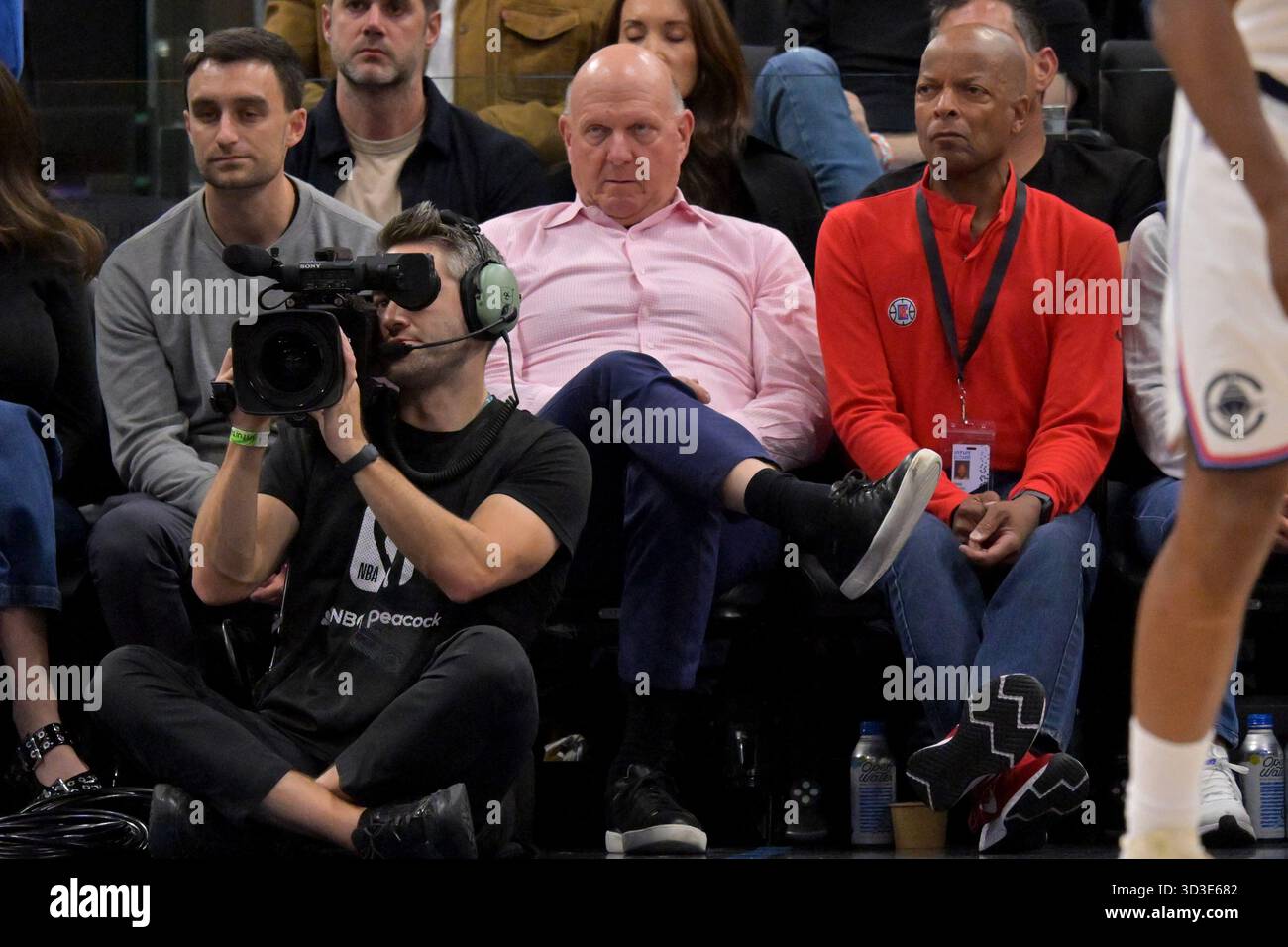 Los Angeles Clippers owner Steve Ballmer, center, watches the NBA ...