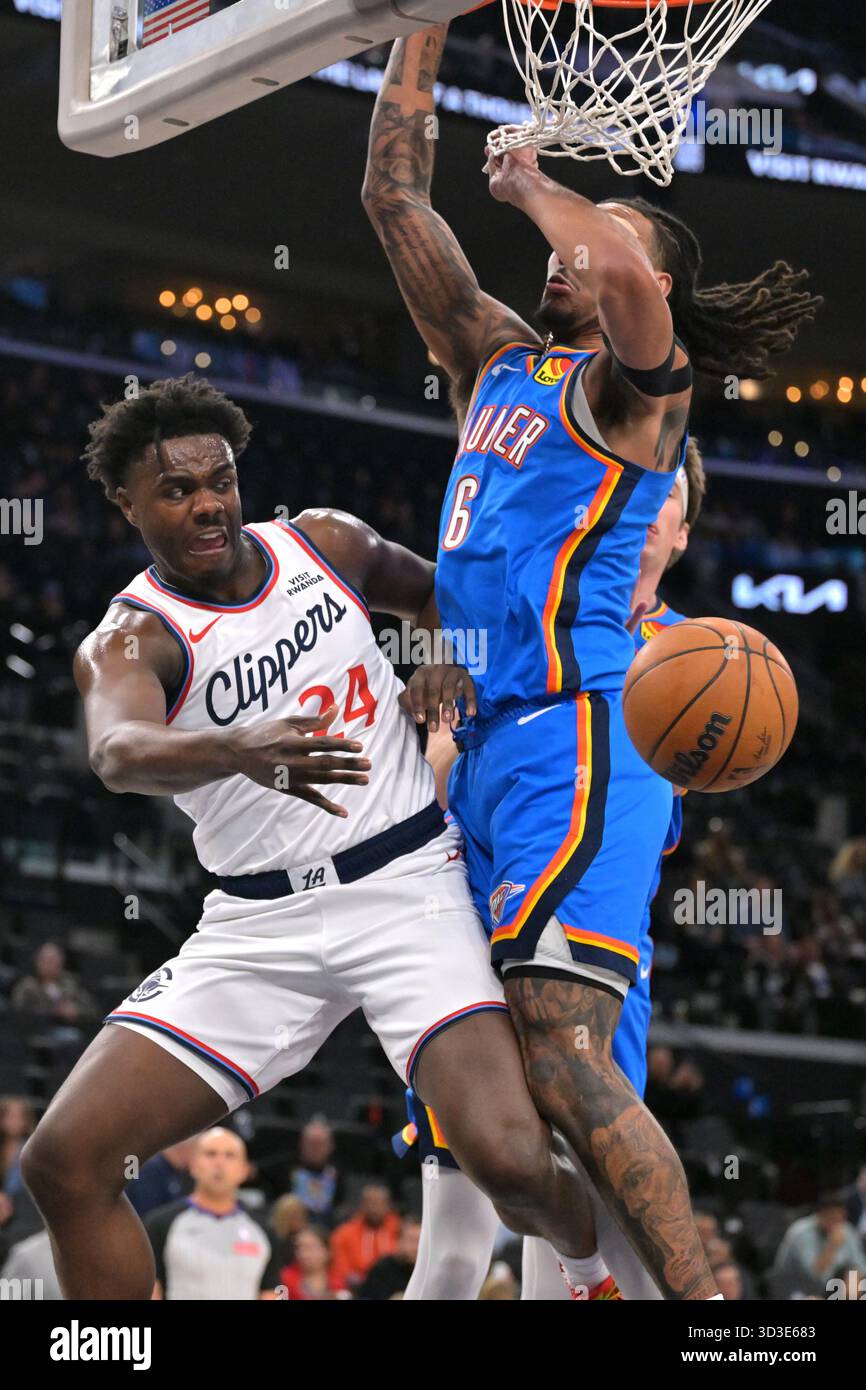 Los Angeles Clippers forward Kobe Brown (24) passes the ball around ...
