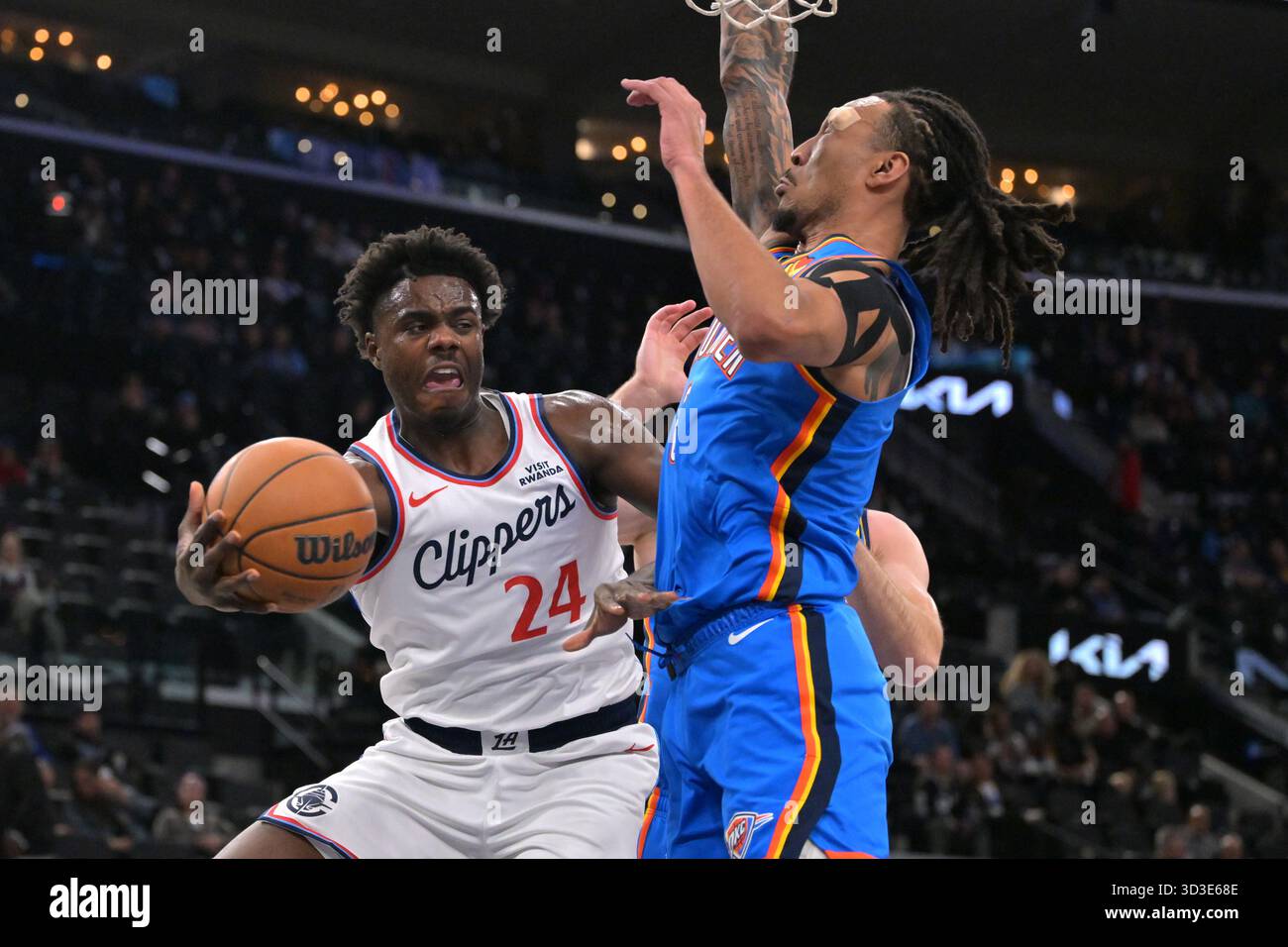 Los Angeles Clippers forward Kobe Brown (24) passes the ball around ...